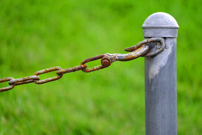 Chain Connected To Pole for Security and Protection Green Background ...