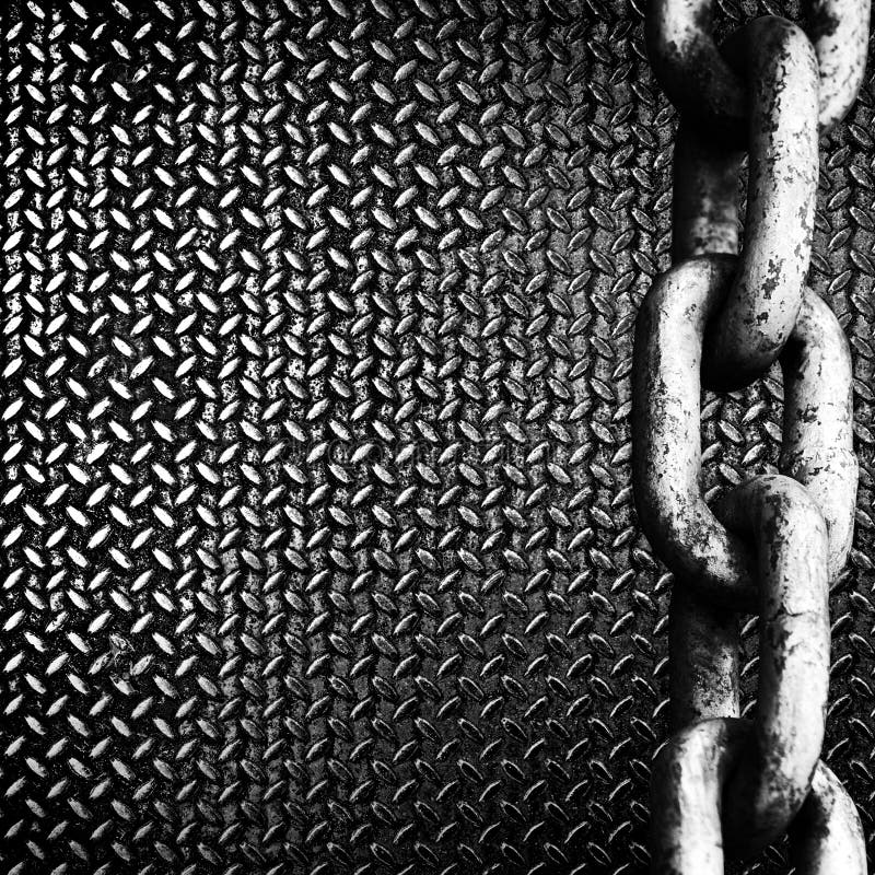 Chain on diamond plate stock image. Image of grid, floor - 11647189