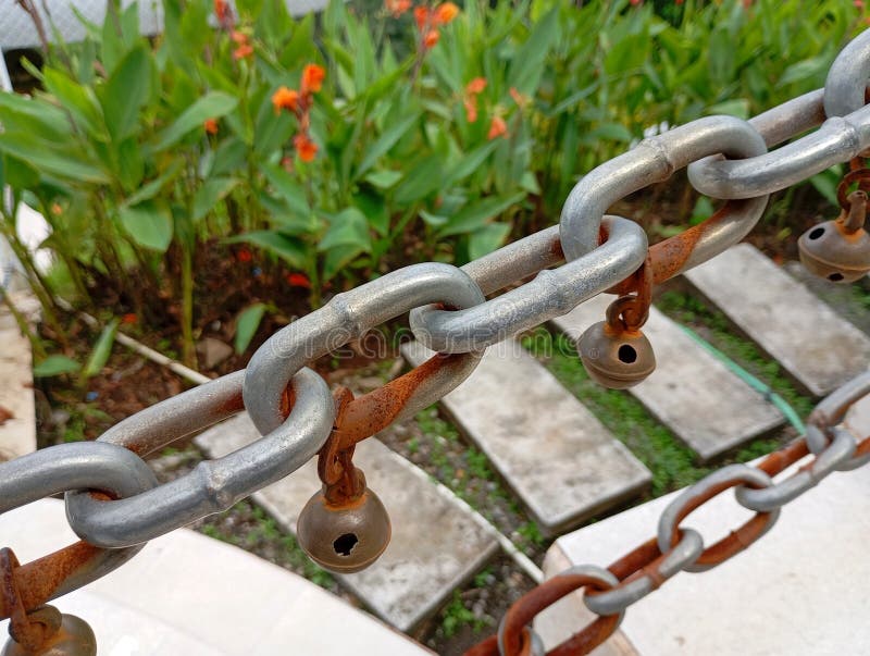Chain on Garden Steps with Bells Stock Image - Image of chain, blurry ...