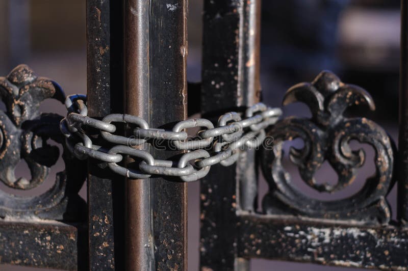 Chain on the iron gate stock image. Image of security - 166531521