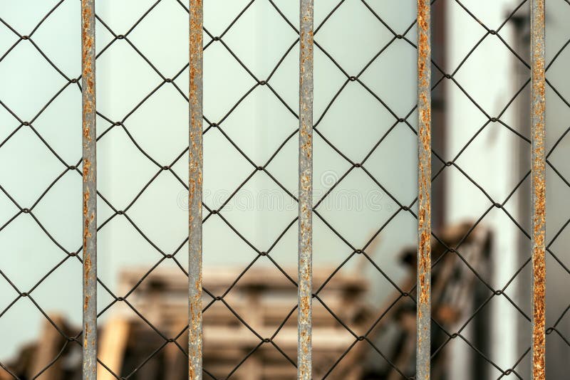 Chain Link Diamond Pattern Wire Fence and Worn Metallic Bars Stock ...