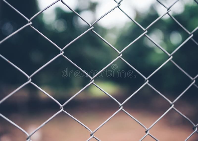 Chain Link Fence with Blurred Background : Demarcation Concept Stock ...