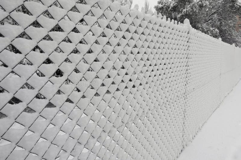 Chain-link Fence Covered with Snow on Cold Winter Day Stock Photo ...