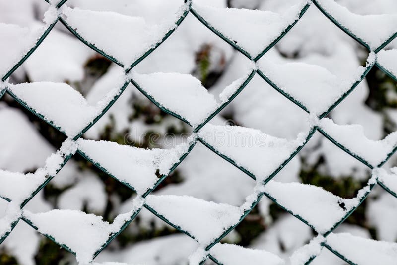 Chain Link Fence with Snow Background in Wintertime Stock Photo - Image ...