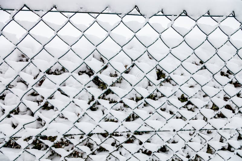 Chain Link Fence with Snow Background in Wintertime Stock Image - Image ...