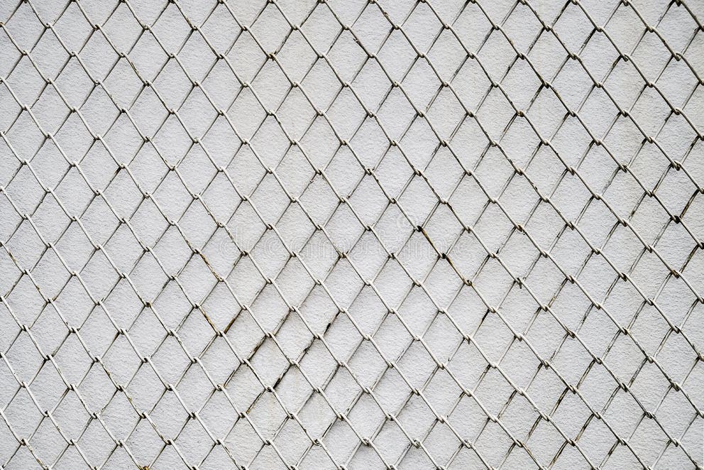 Chain Link Fence on White Cement Wall Background Stock Image - Image of ...