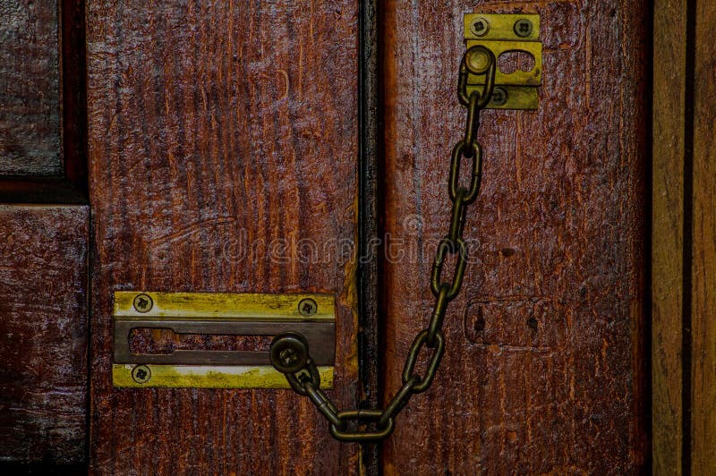 Chain lock on door. stock image. Image of rustic, lock - 114925353