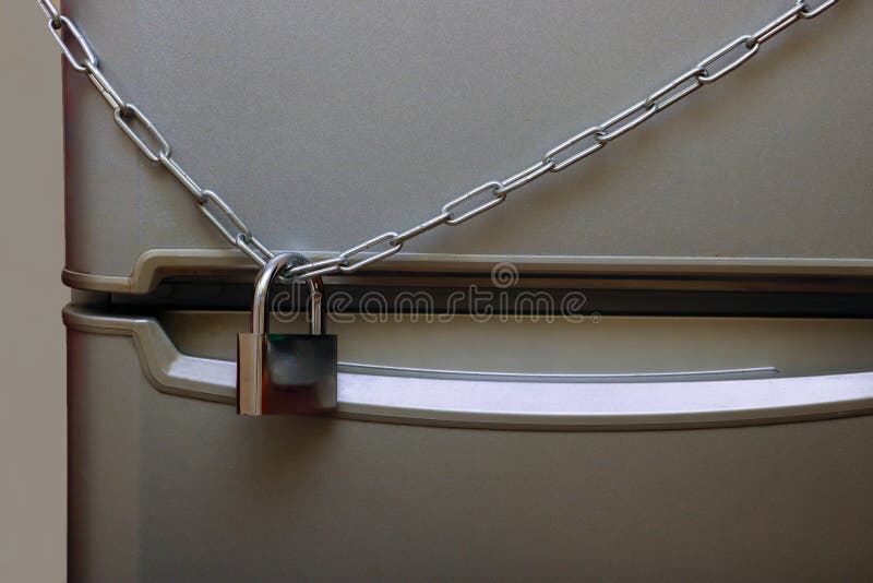 Chain and Lock Hanging on the Refrigerator Stock Photo - Image of ...