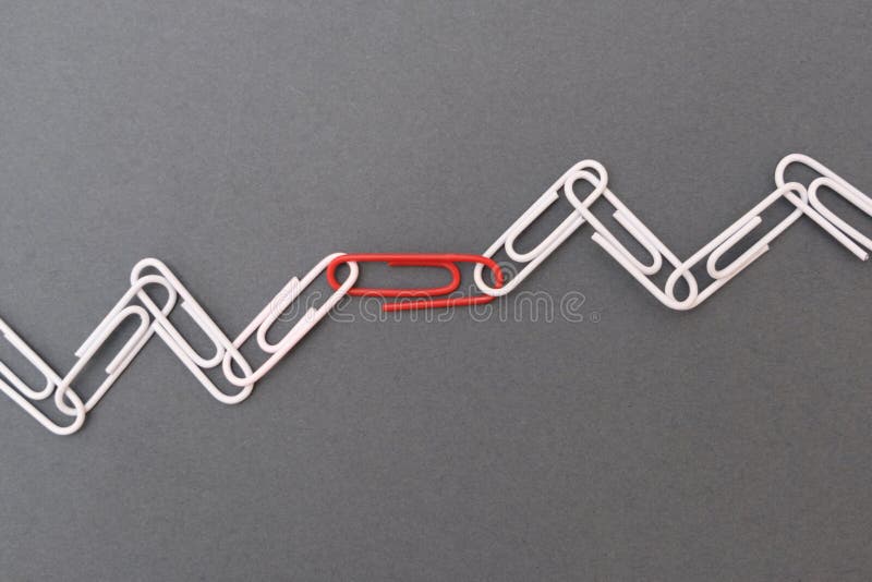 Chain Made of Paper Clips Meaning Teamwork and Cooperation Stock Image ...