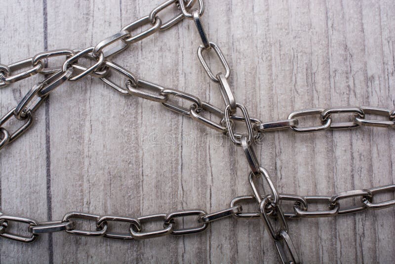 Chain Made of Silver Color Metal on a Grey Background Stock Image ...