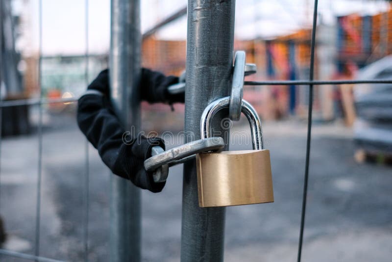 Chain and Padlock on Gate at Construction Site Stock Image - Image of ...