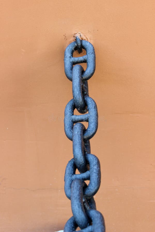 A Chain Painted in Black Affixed To the Wall. Photo with Selective ...