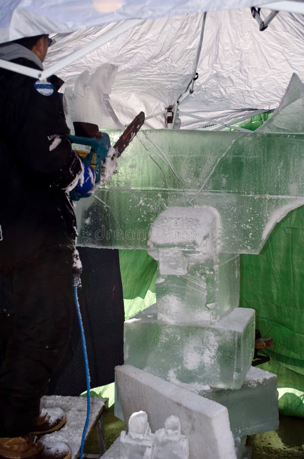 Chain saw and ice editorial photo. Image of hobby, winter - 29583841