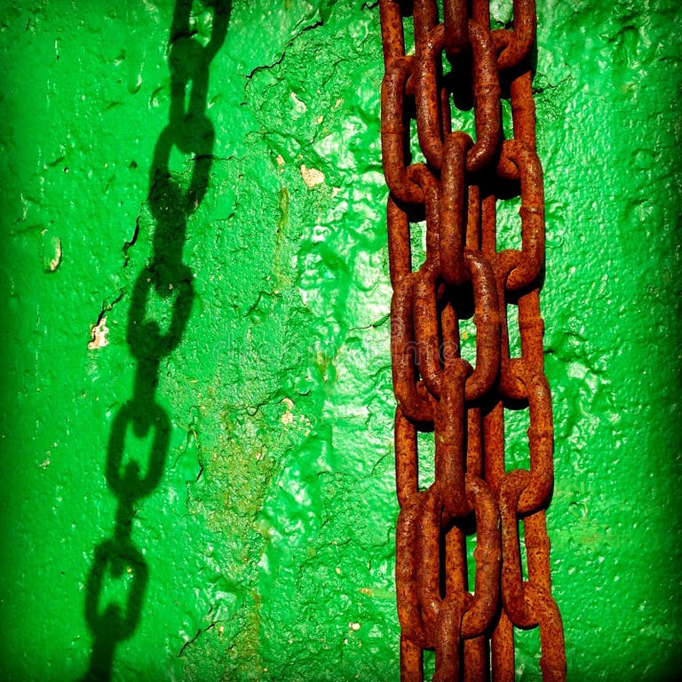 Chain shadow on green wall stock photo. Image of close - 66943462
