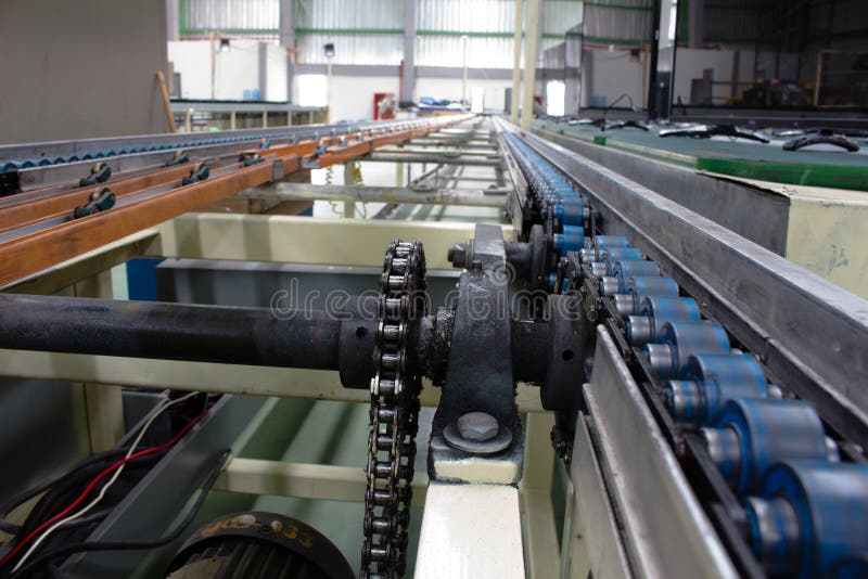 The Chain and Shaft Drive Line Conveyor Stock Photo - Image of ...