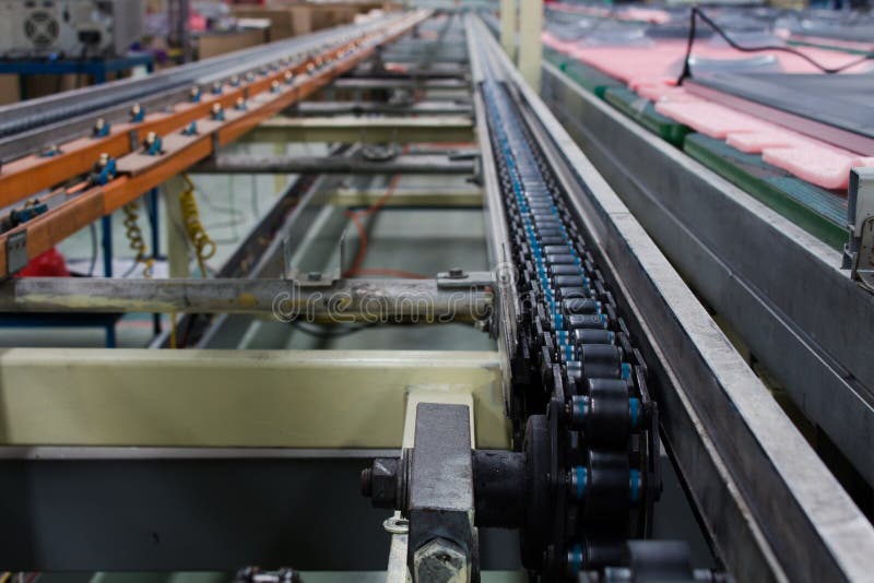 The Chain and Shaft Drive Line Conveyor Stock Image - Image of modern ...