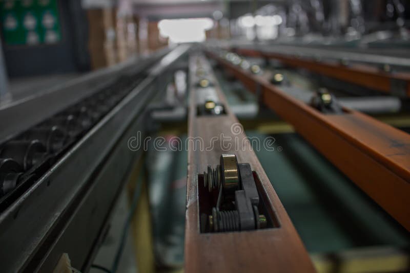 The Chain and Shaft Drive Line Conveyor Stock Image - Image of ...