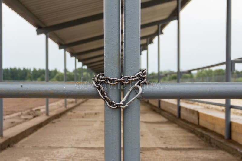 Chain Wound Around the Gate at the Entrance. Closed Area. No Way Stock ...