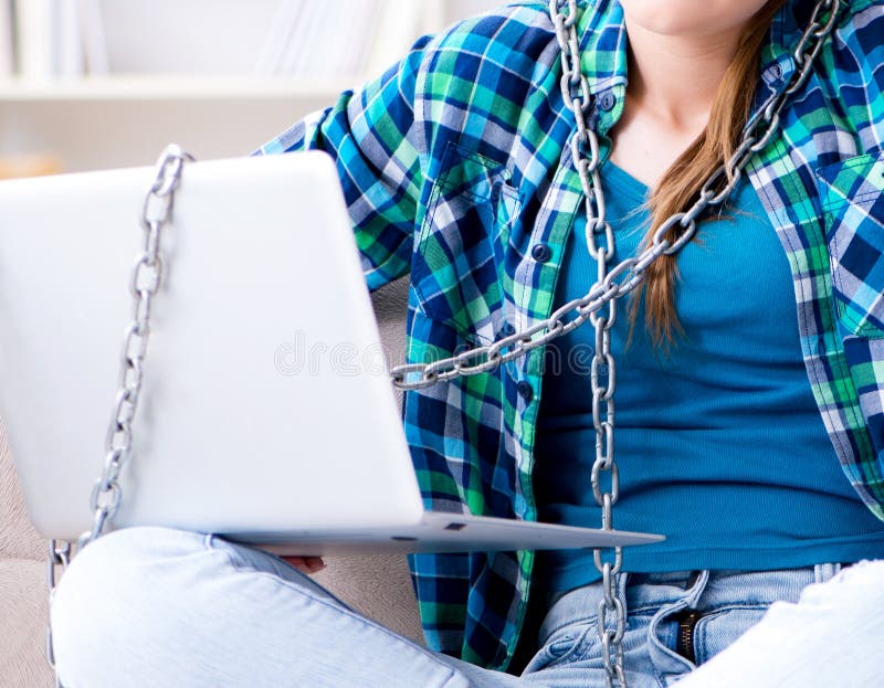 Chained Female Student with Laptop Sitting on the Sofa Stock Photo ...