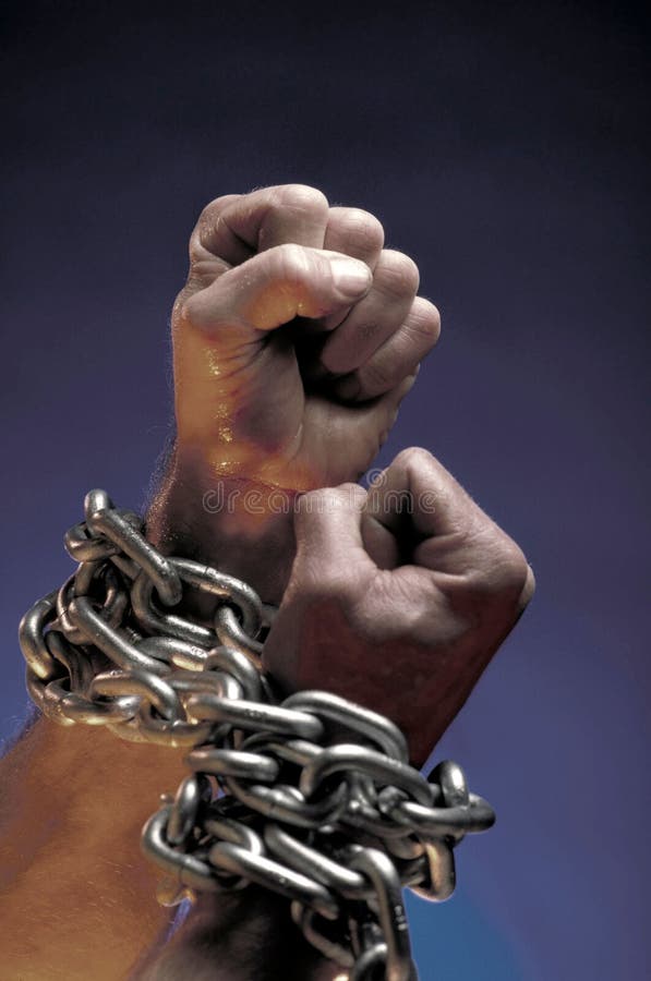 Chained Hands stock photo. Image of enslaved, captive - 297992846
