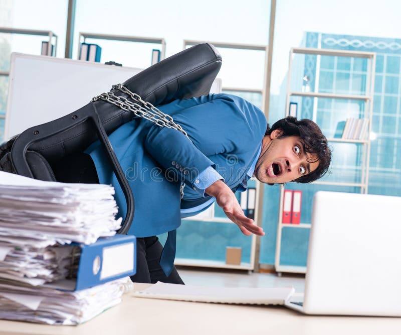 Chained Male Employee Unhappy with Excessive Work Stock Image - Image ...