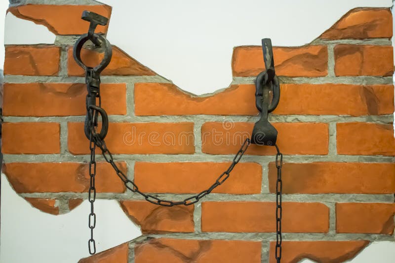 The Chains, the Slave Chains on the Wall of Red Brick Stock Image ...