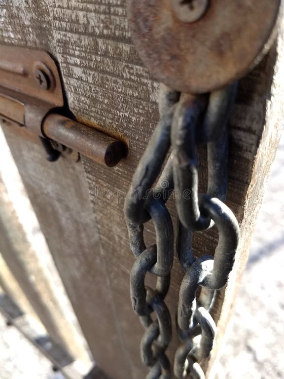 Chains and wood lock farm stock image. Image of farm - 111535481