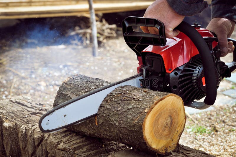 Chainsaw blade cutting stock image. Image of chip, occupation - 54409279