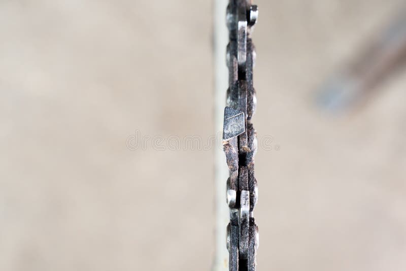 Chainsaw Chain Close-up on a Blurred Background, Top View. Tool ...