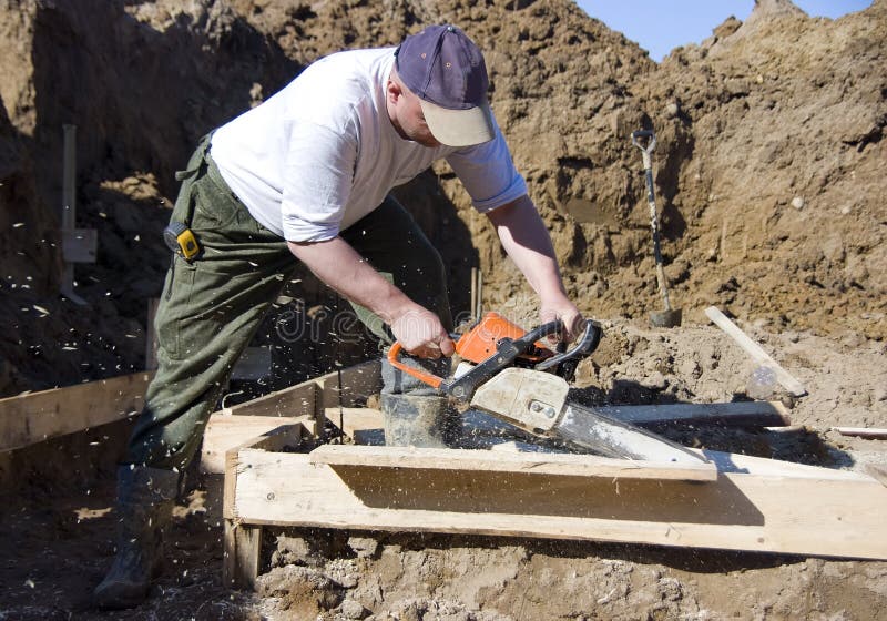 Chainsaw cutting stock image. Image of chainsaw, worker - 4987739