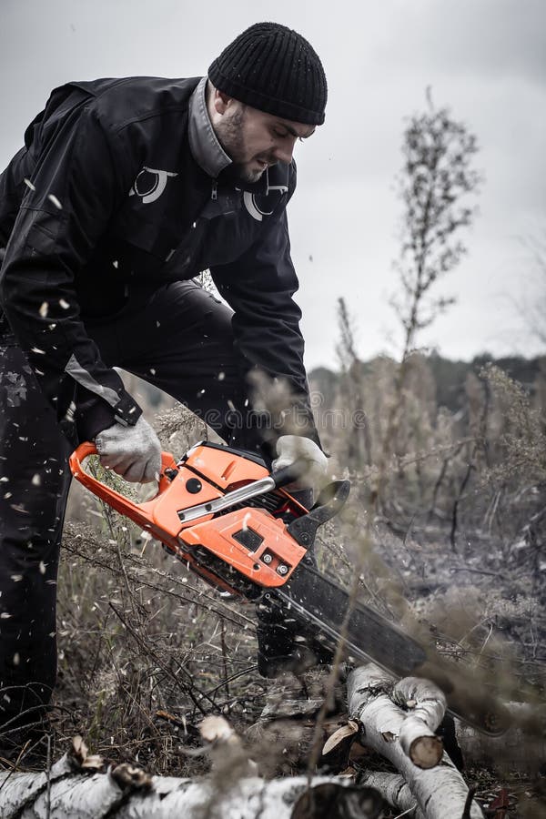 Man Chainsaw Side View Stock Photos - Free & Royalty-Free Stock Photos ...