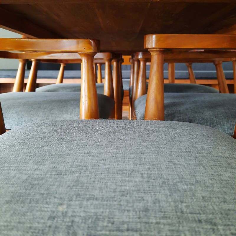 Chair Arms Underneath the Dining Table Stock Image - Image of chair ...