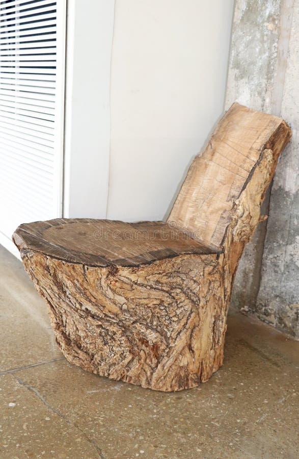 A Chair Carved from a Tree Trunk Stock Image - Image of wooden, chair ...