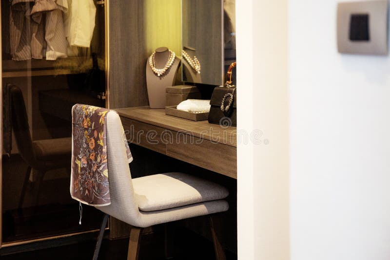 Chair and clothes in room stock image. Image of fashion - 142910155