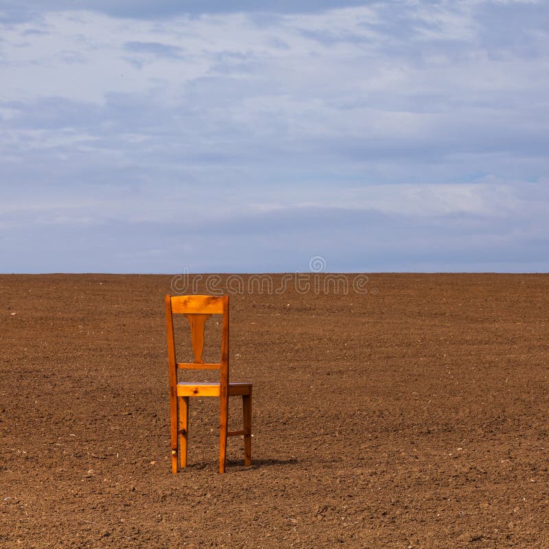 Lonely chair on the field stock photo. Image of grain - 33953704