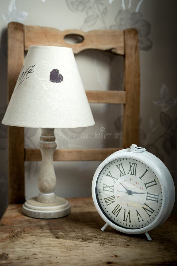 Chair, Lamp and Alarm Clock in Vintage Style Stock Photo - Image of ...