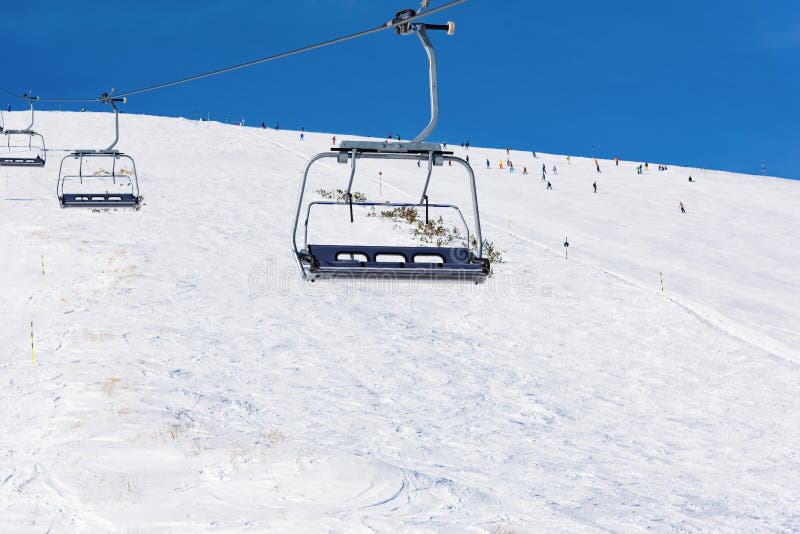 Chair lift for skiing stock image. Image of downhill - 67161587