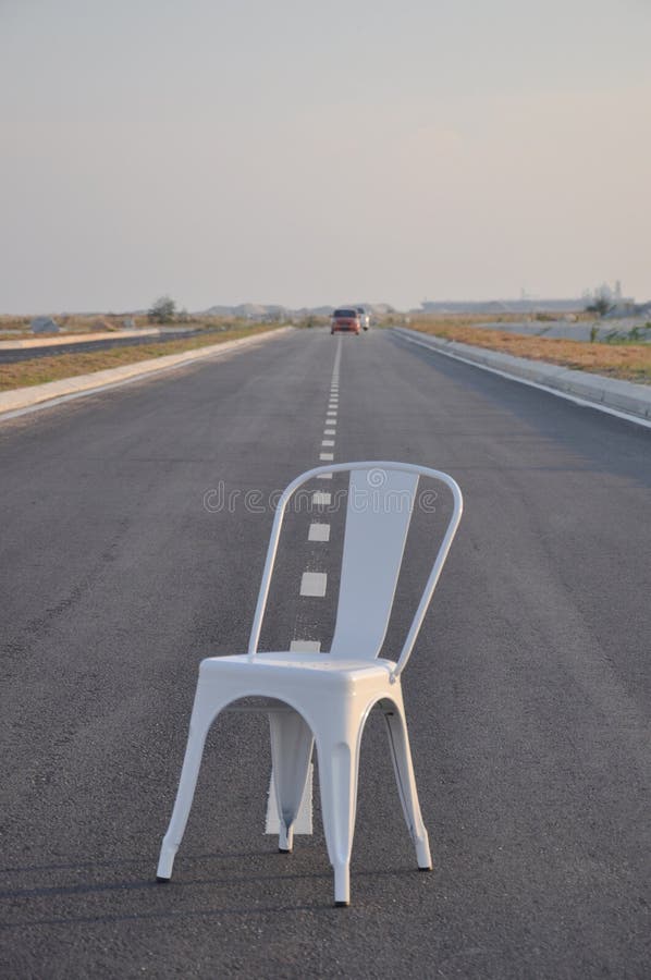 A Chair in the Middle of the Road Stock Image - Image of middle, chair ...