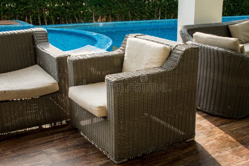 Chair near swimming pool stock image. Image of resort - 92669715