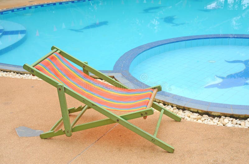 Chair and pool stock illustration. Illustration of calm - 22708263