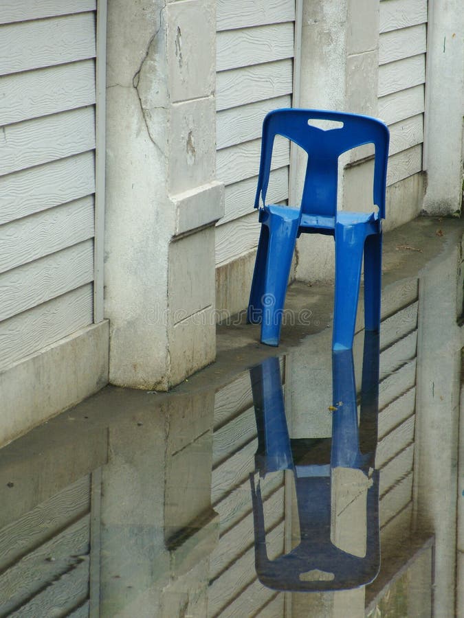 Chair with Reflection on Water Stock Photo - Image of furniture, wall ...