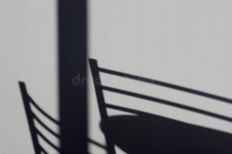 Chair Shadow on White Wall. Stock Photo - Image of dark, empty: 69414554