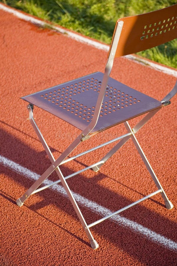 Chair Standing on the Athletics Track. Stock Image - Image of ...