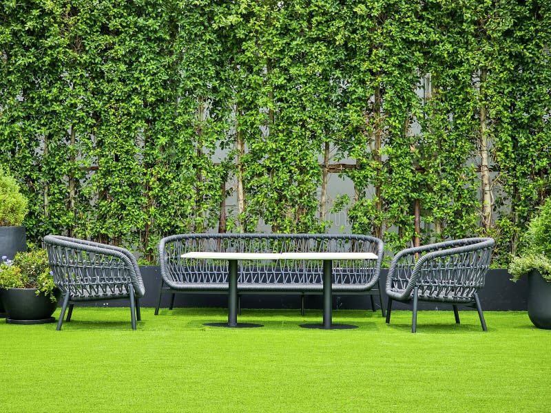 Chair and Table on the Grass Artificial. Relaxing Seats Outdoor Stock ...