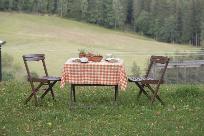 Chair and Table in an Outdoor Environment Stock Photo - Image of ...