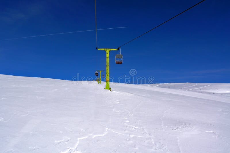 Chairlift snow and and sky stock photo. Image of blue - 7493284