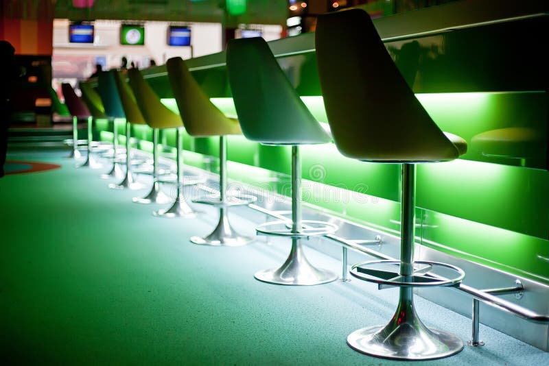 Chairs in Bar with Green Lights Stock Photo - Image of party, empty ...