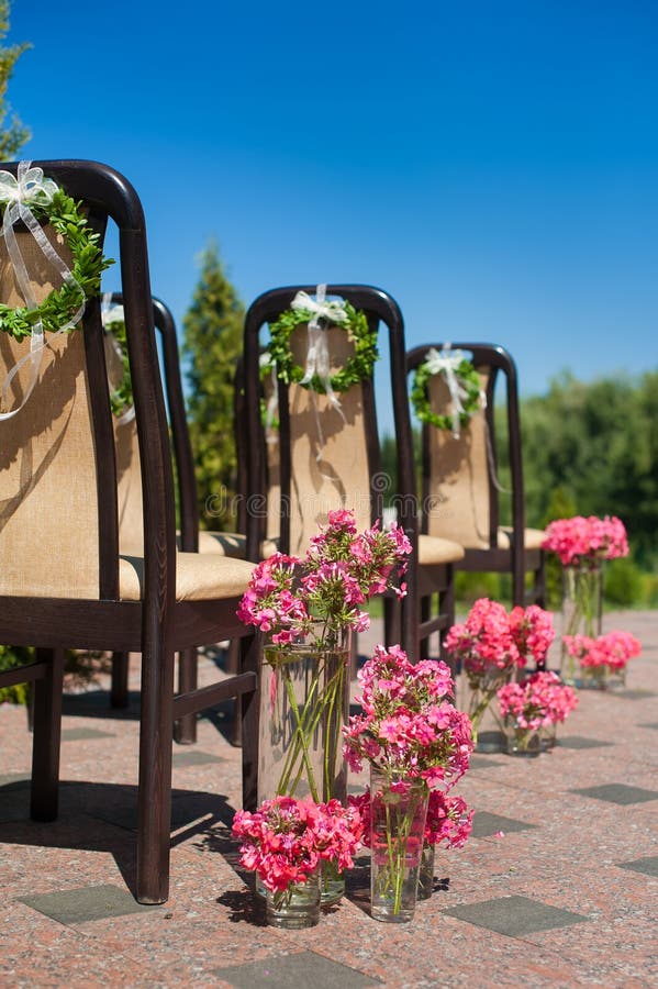 Chairs Decorated with Flowers Stock Photo - Image of leaves, object ...