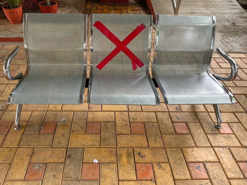 Chairs Marked with Red Cross for Maintaining Social Distancing Stock ...