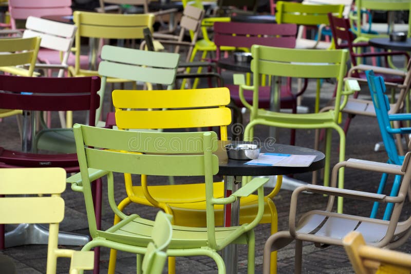 Chairs at an outdoor cafe stock photo. Image of green - 15633378